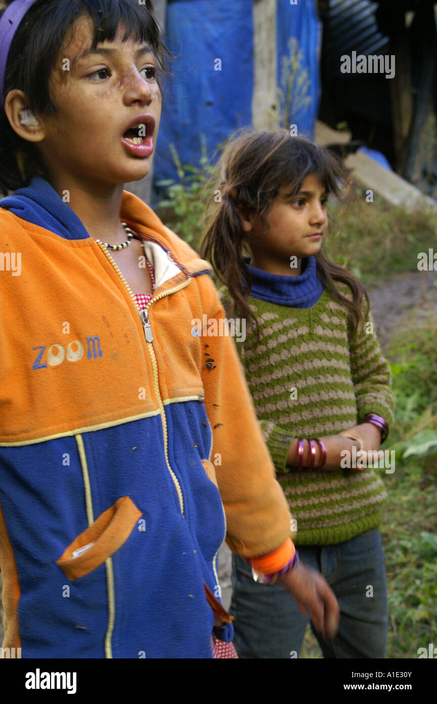 Two young native indian children girls shouting outdoors, Kalga village ...