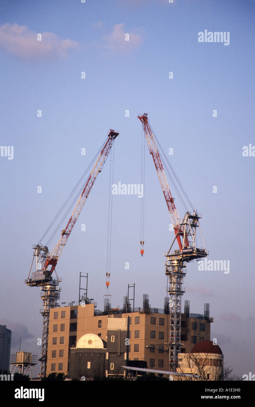 Construction cranes at a building site in Tokyo Japan Asia Stock Photo ...