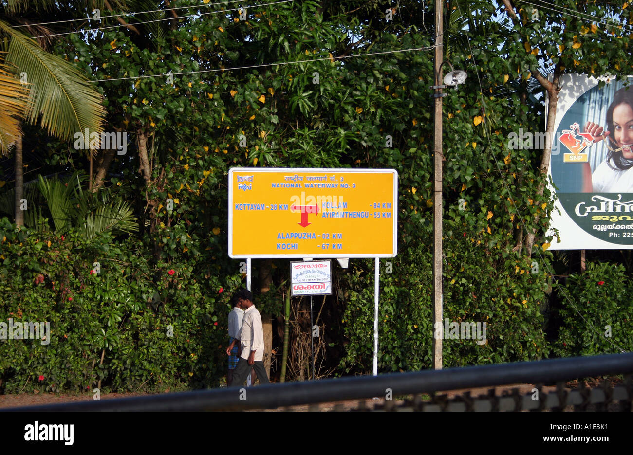 Sign detailing distances to local towns Backwaters Kerala India Stock ...