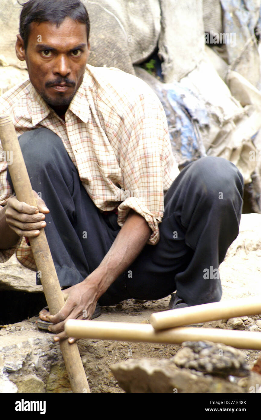 Man digging hole in road hi-res stock photography and images - Alamy
