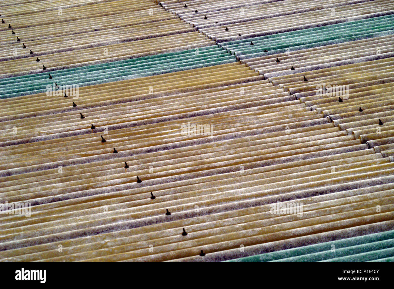 Laminate wave roof tiles Stock Photo - Alamy
