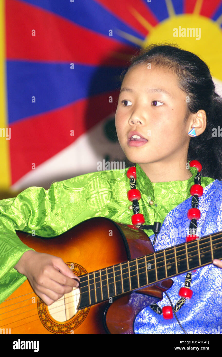 Young girl singer performer of tibetan arts music in front of national ...