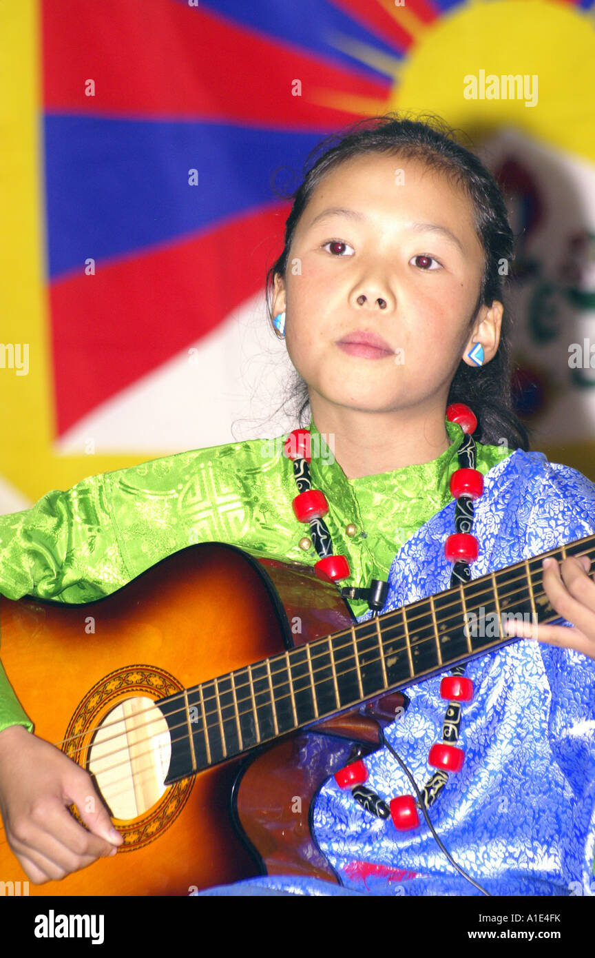 Young girl singer performer of tibetan arts music in front of national ...