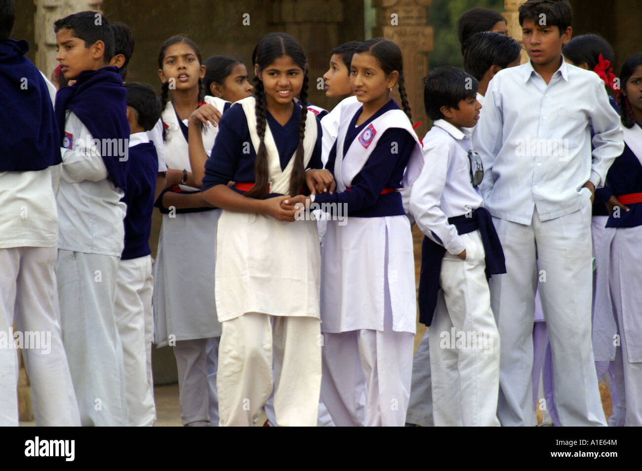 Young indian child kid girl boy school trip at Qutb Minar in New Delhi ...