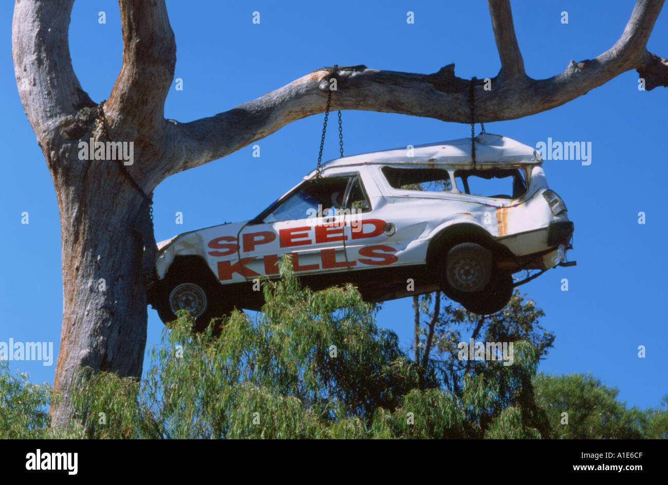 Wrecked car Speed kills accident warning Stock Photo - Alamy