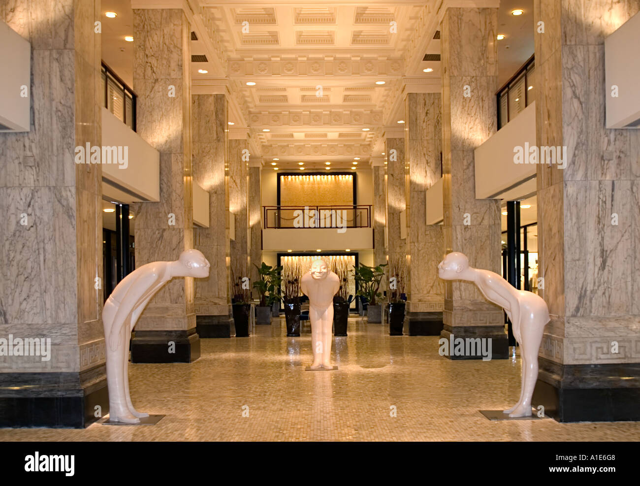 Bowing Chinese sculptures Beijing Hotel China Stock Photo - Alamy