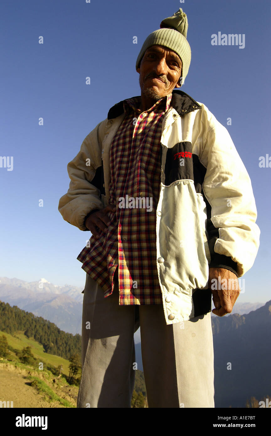 Portrait of very old indian man highlander standing on alpine meadow in ...