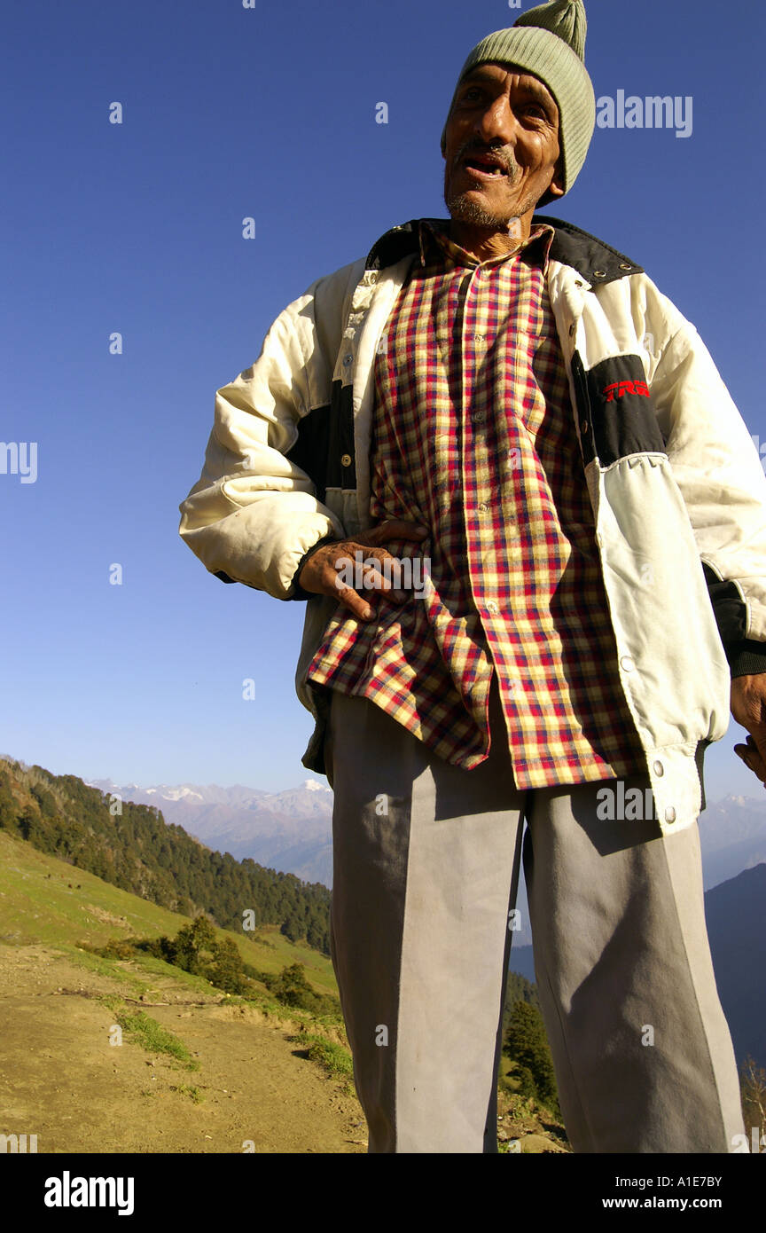 Portrait of very old indian man highlander standing on alpine meadow in ...