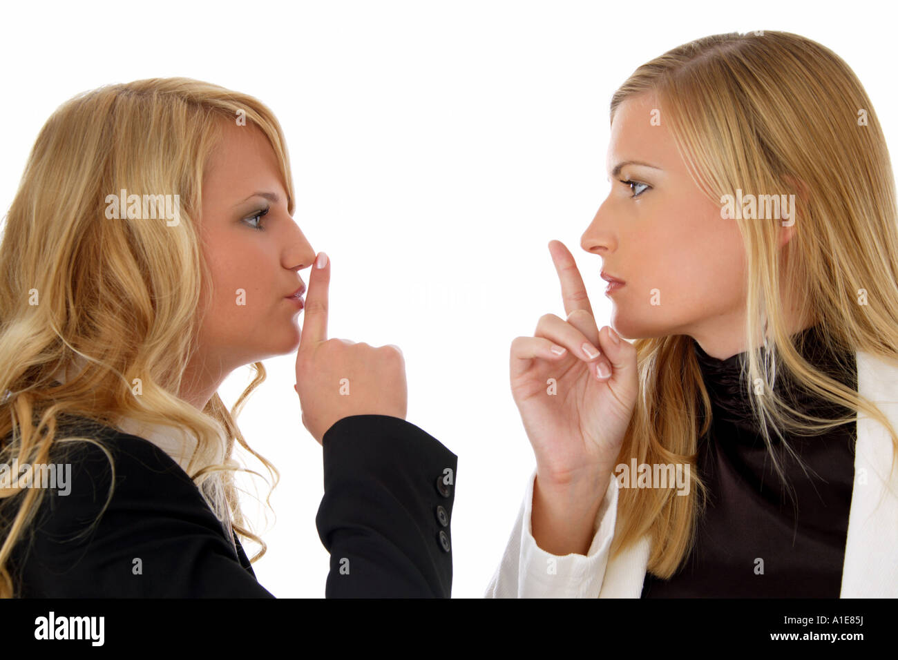 Young woman shushing beauty hi-res stock photography and images - Alamy