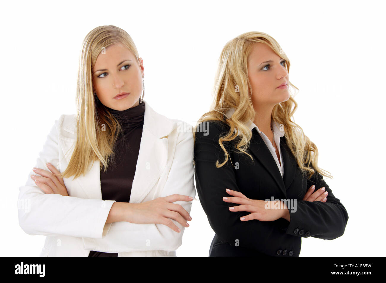 Two women standing next to each other hi-res stock photography and ...