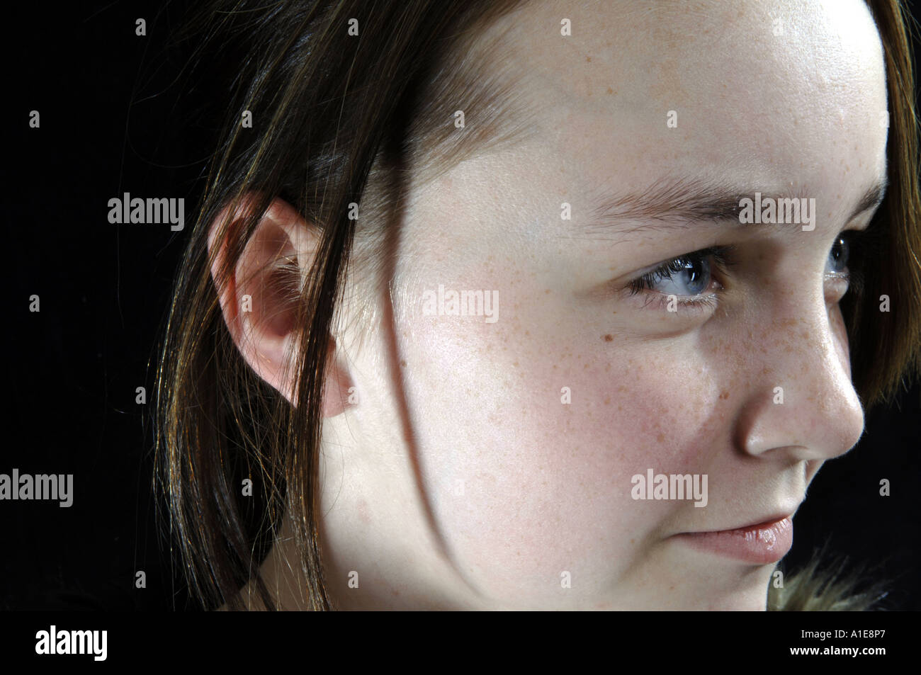 girl looking right out of the frame Stock Photo - Alamy