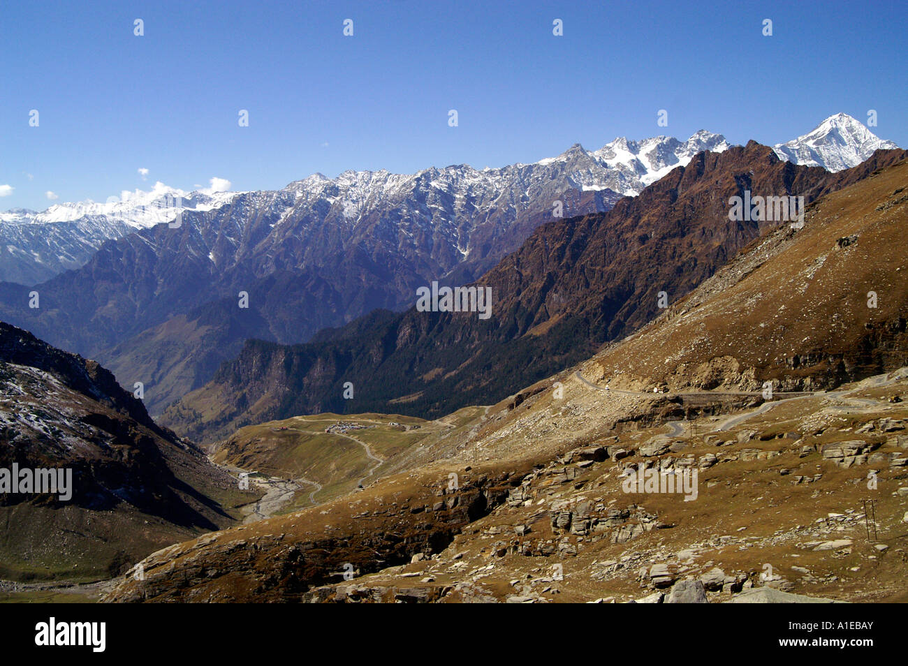 Meander road towards Rohtang pass at the end of Kullu Valley, Indian ...