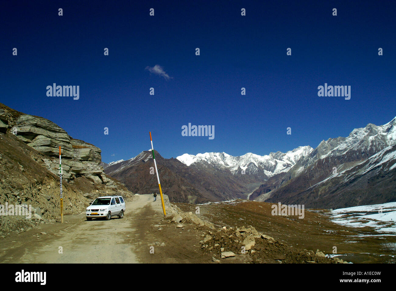 Car at road in Rohtang pass at the side of Chandra Valley, Indian ...