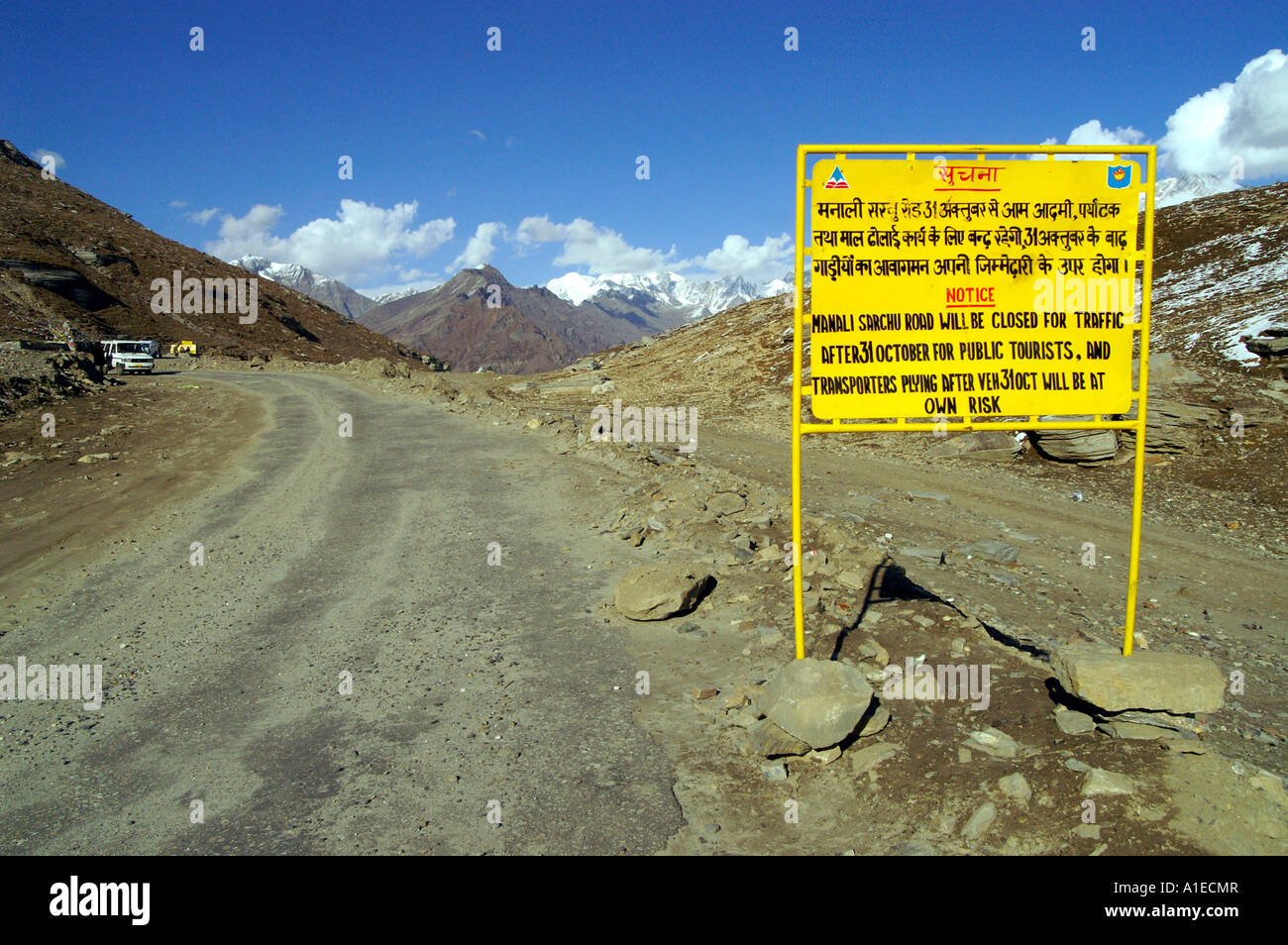 Twisted road with yellow sign in Rohtang pass at the side of Lahaul ...