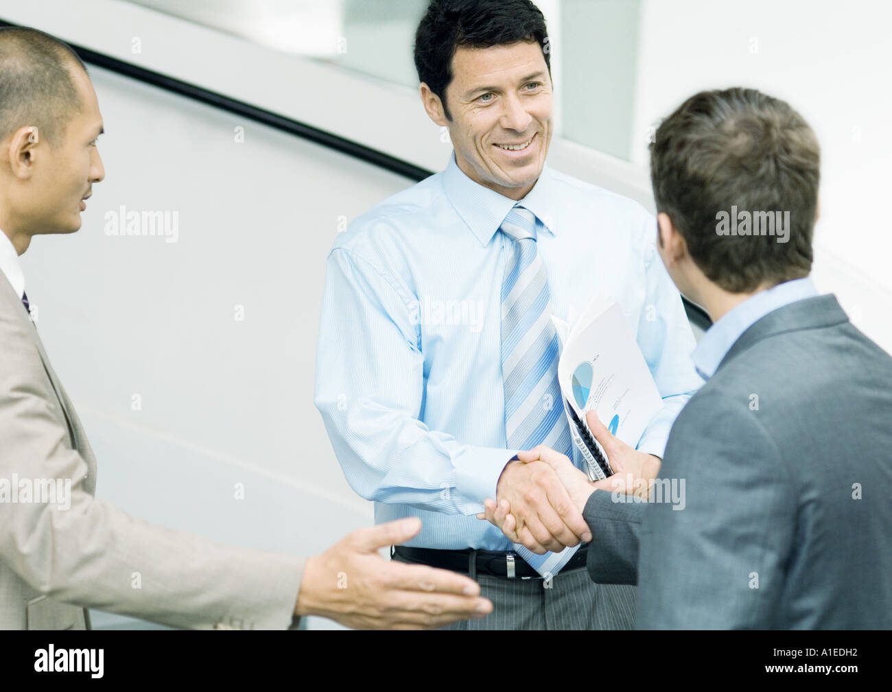 Being introduced to colleagues hi-res stock photography and images - Alamy