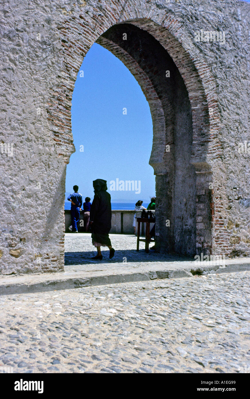AFRICA MOROCCO TANGIER Stone archway of the Casbah leading to viewing ...