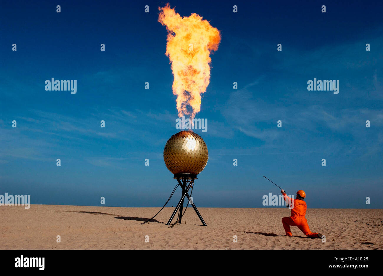 A beacon bursts into flame as it is tested on the eve of her Majesty's ...