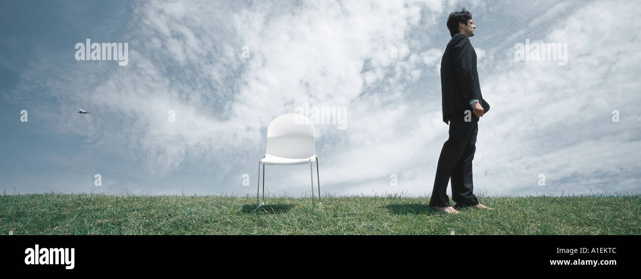 Man standing up from chair hi-res stock photography and images - Alamy