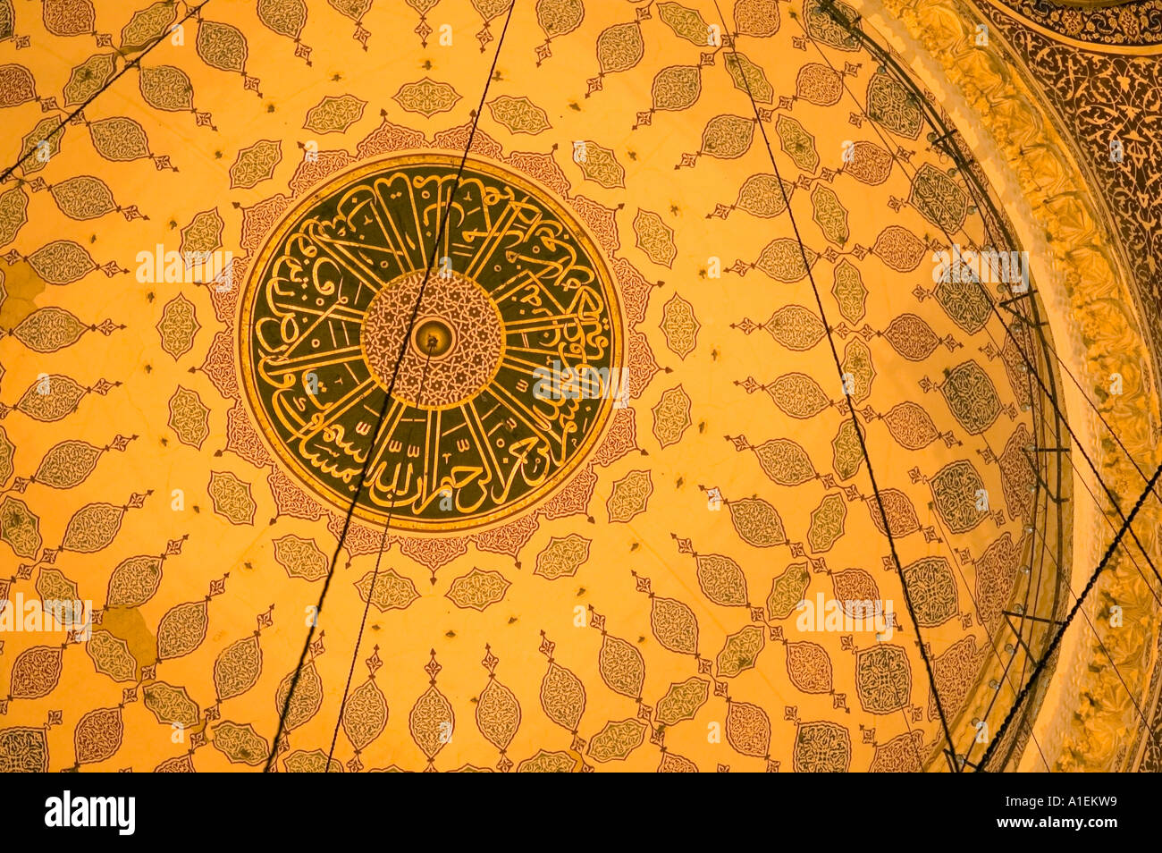 View looking up at the richly decorated ceiling domes of the New Mosque ...