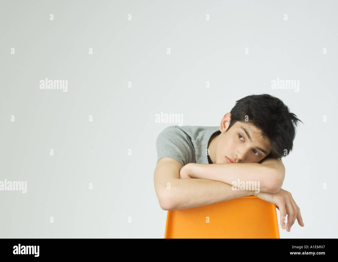 Man Sitting On Chair Backwards High Resolution Stock Photography and ...