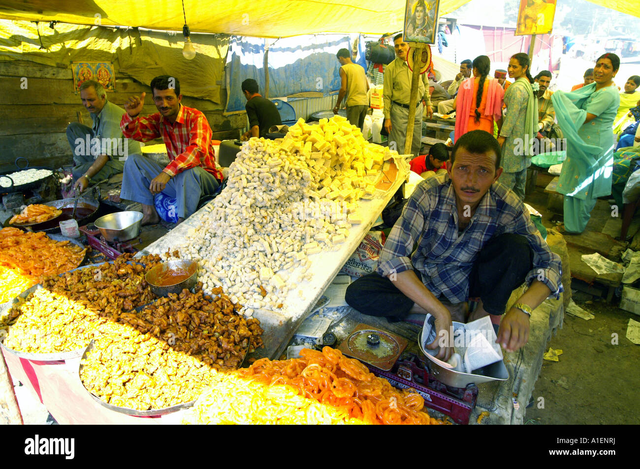 Stall with sweets at Dussehra fair with enormous variety of rich Indian ...