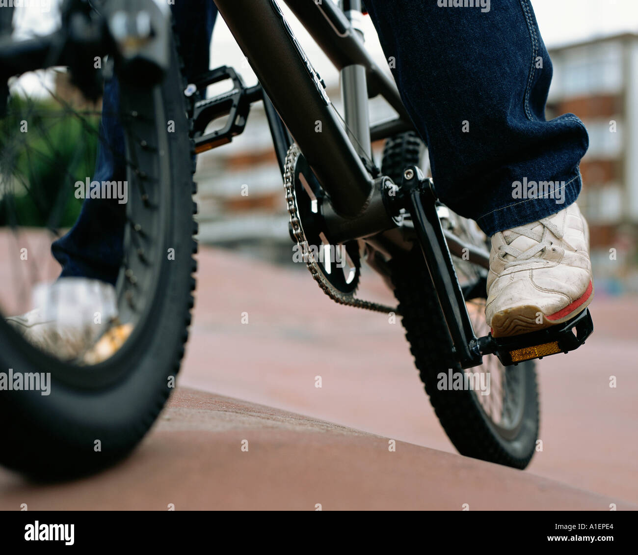 Boy riding a BMX bicycle Stock Photo - Alamy