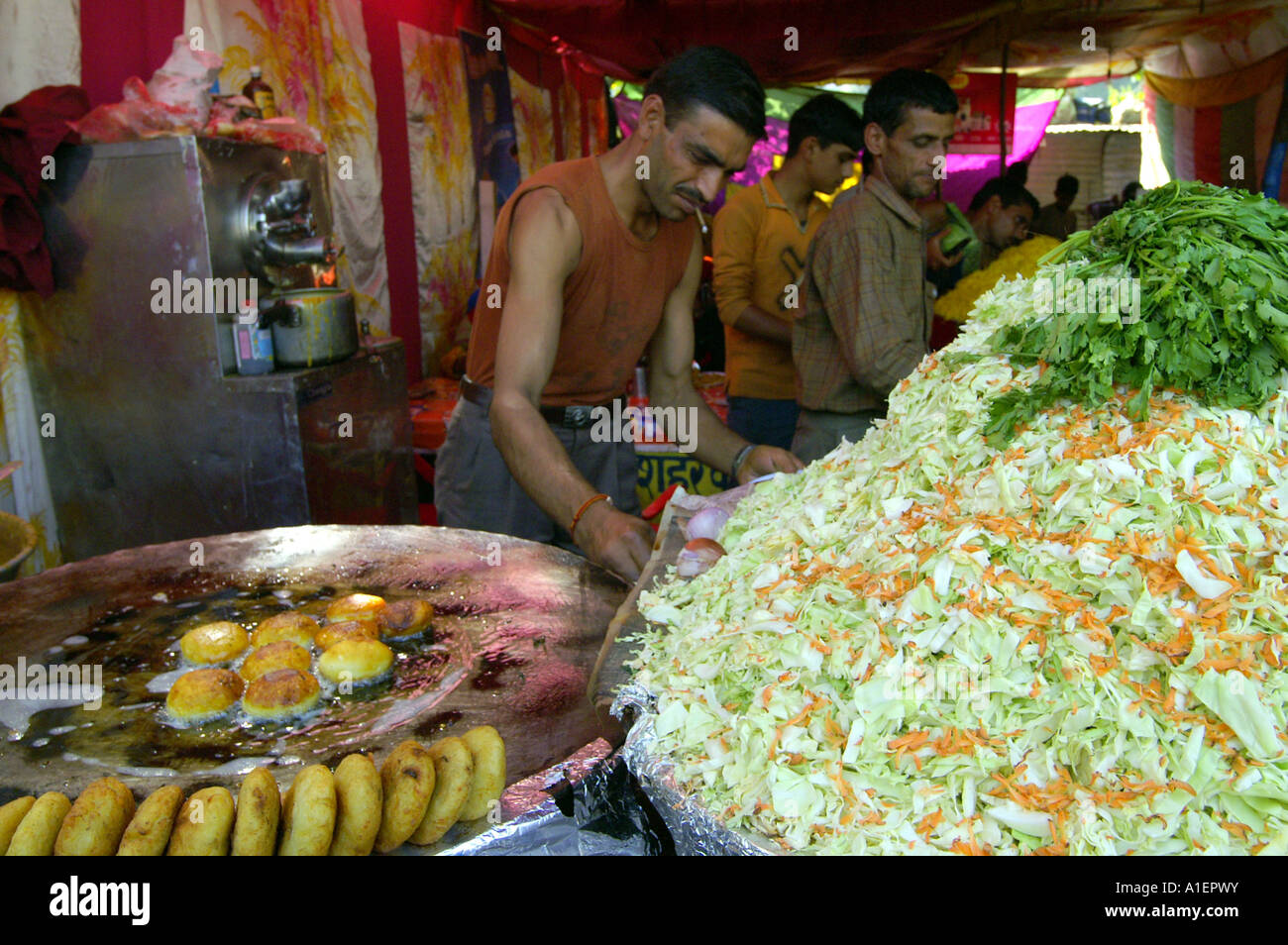 Stall with snacks at Dussehra fair with enormous variety of rich Indian ...