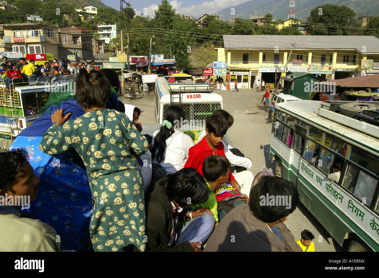 Chaos at Kullu Bus Station, crowds travelling on roof of overfull bus ...