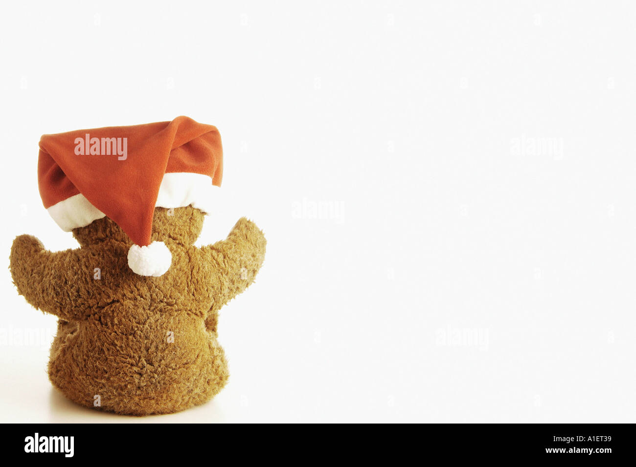 Teddy bear with bobble hat Stock Photo - Alamy