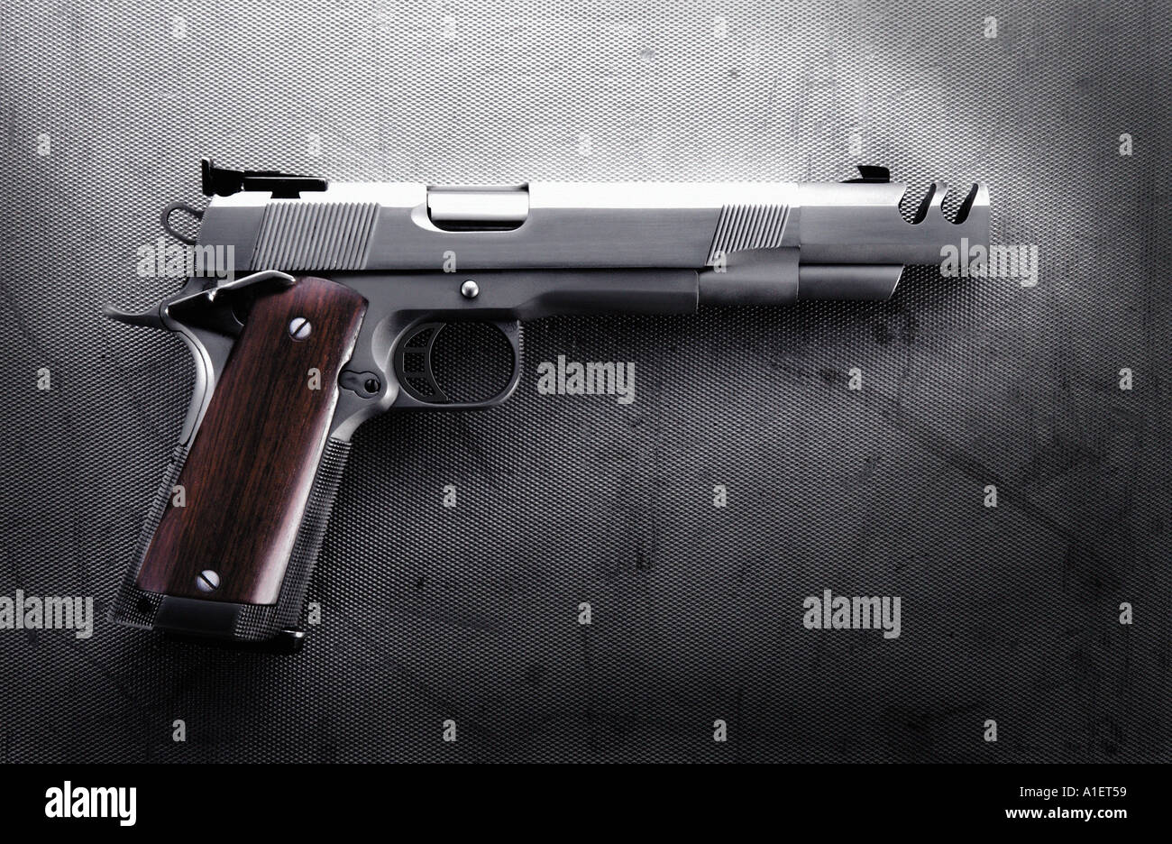 Silver handgun hi-res stock photography and images - Alamy