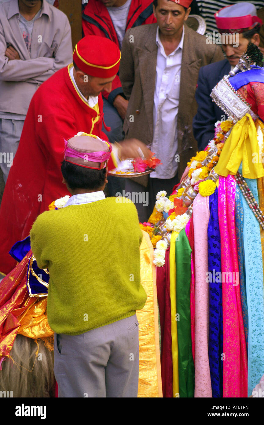 Hinduistic priest performing mysterious rituals at temple yard ...