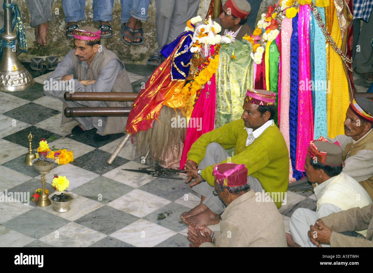 Hinduistic priest performing mysterious rituals at temple yard at ...
