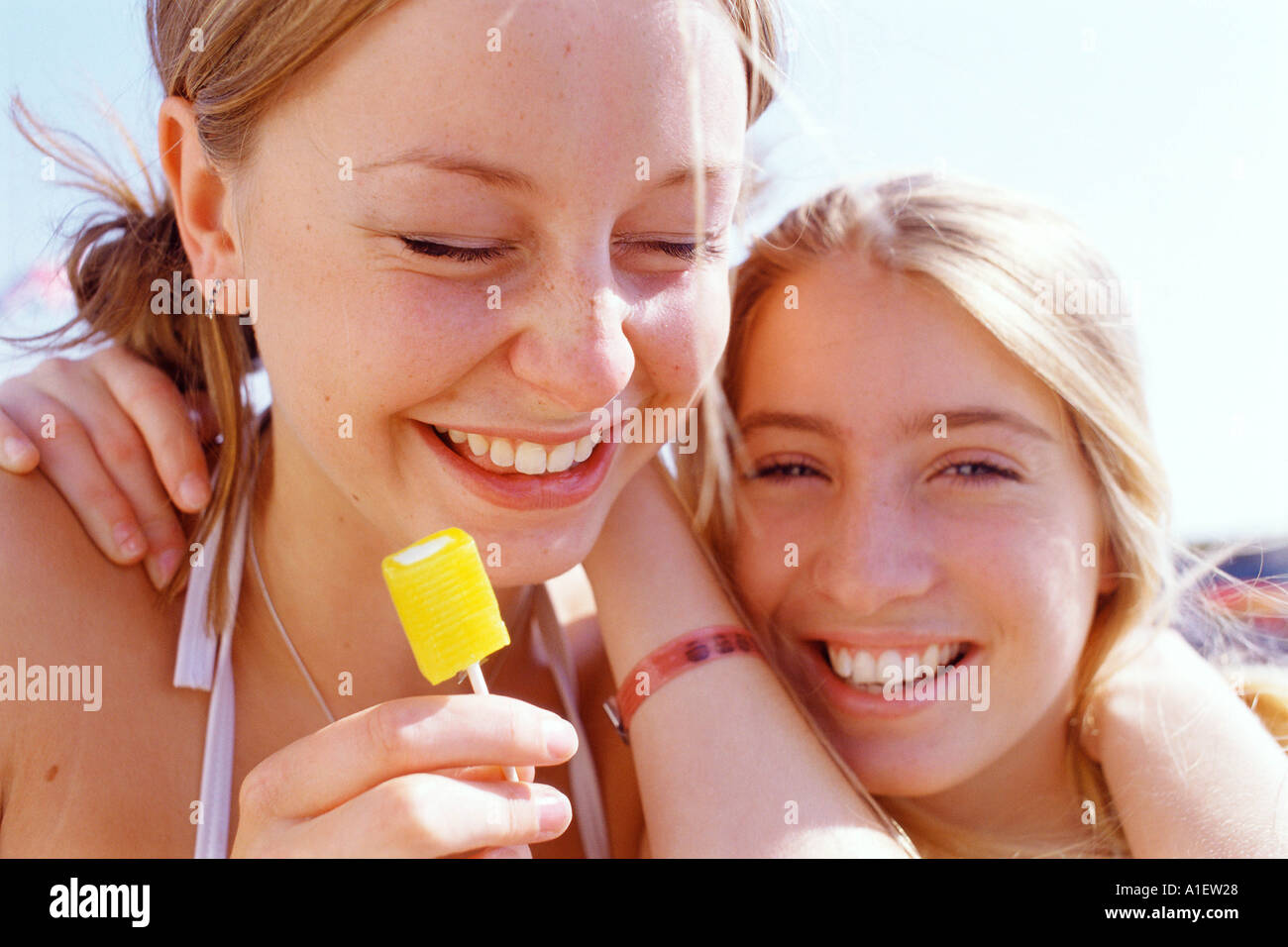 Happy girls smiling Stock Photo - Alamy