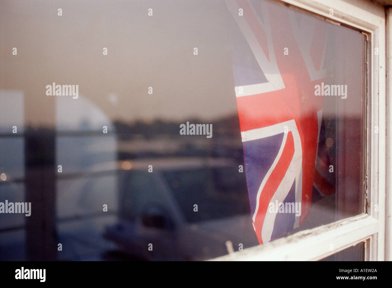 Union Jack seen through a window Stock Photo - Alamy
