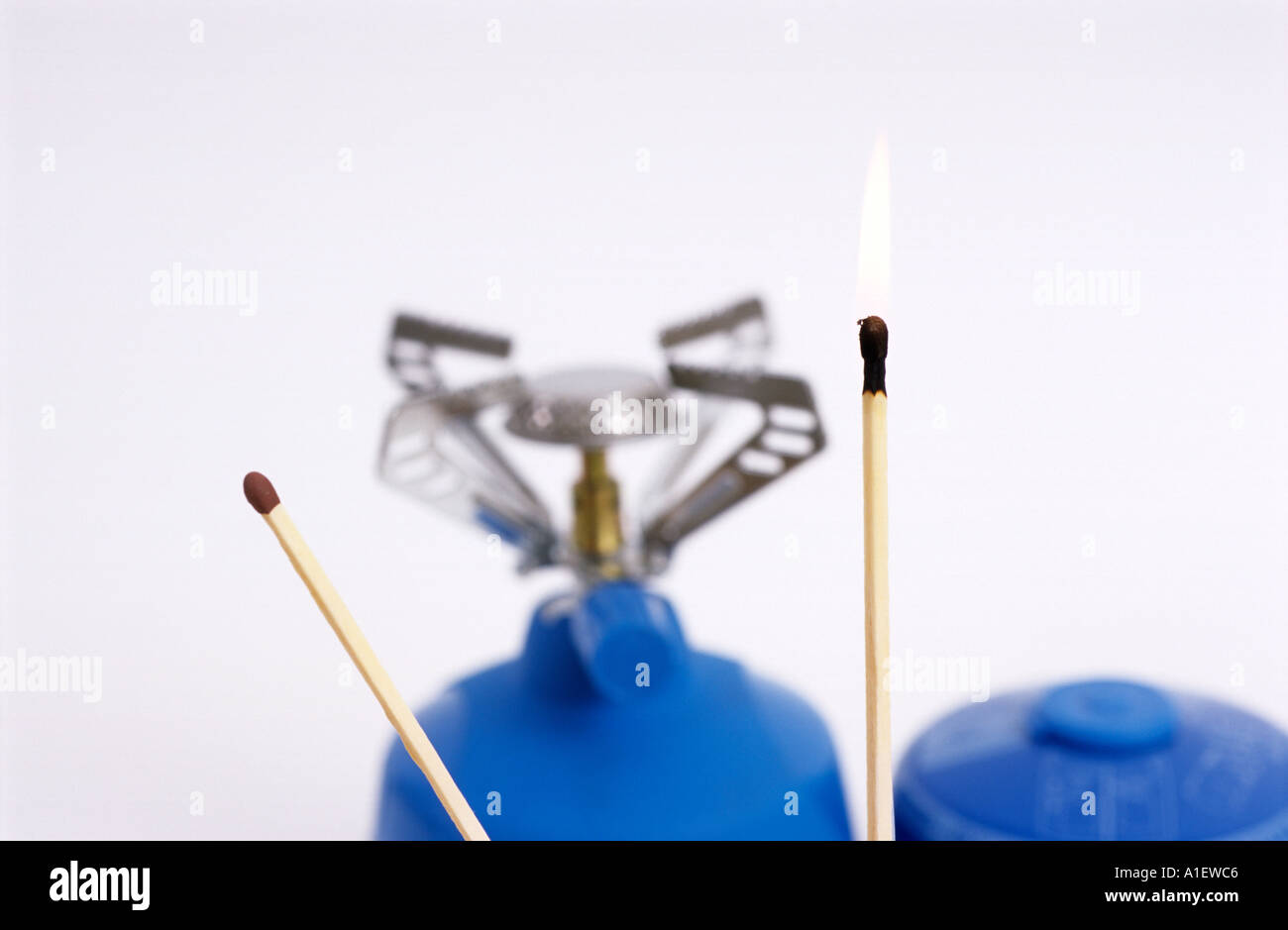 Camping gas cooker two matches Stock Photo - Alamy