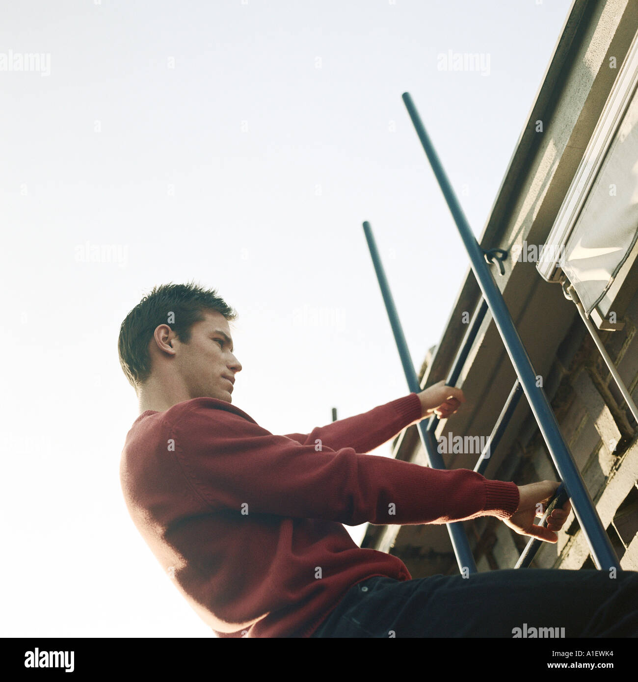 Construction climbing ladder up roof hi-res stock photography and ...