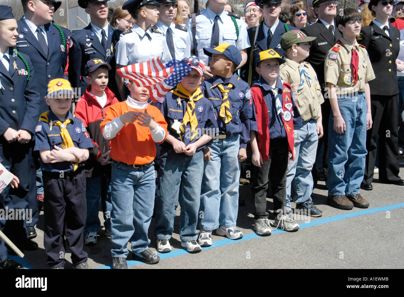 cub and boy scouts participate in a Memorial Day festival and parade ...