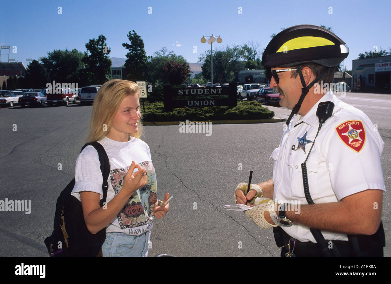 Boise State University campus police officer talking with student Stock ...