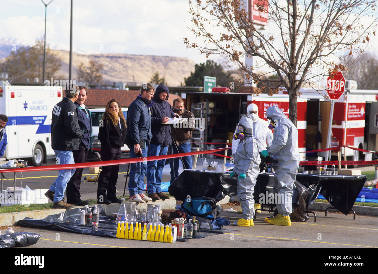 Drug enforcement and hazardous materials agents raid a drug lab Stock ...