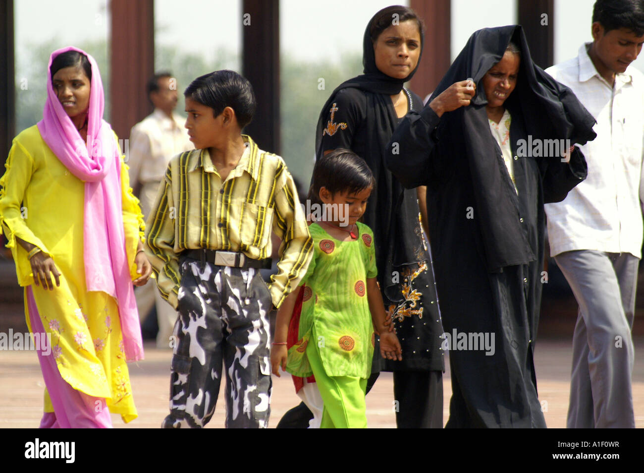 Indian muslim family walking in Jama Masjid mosque, New Delhi Stock ...