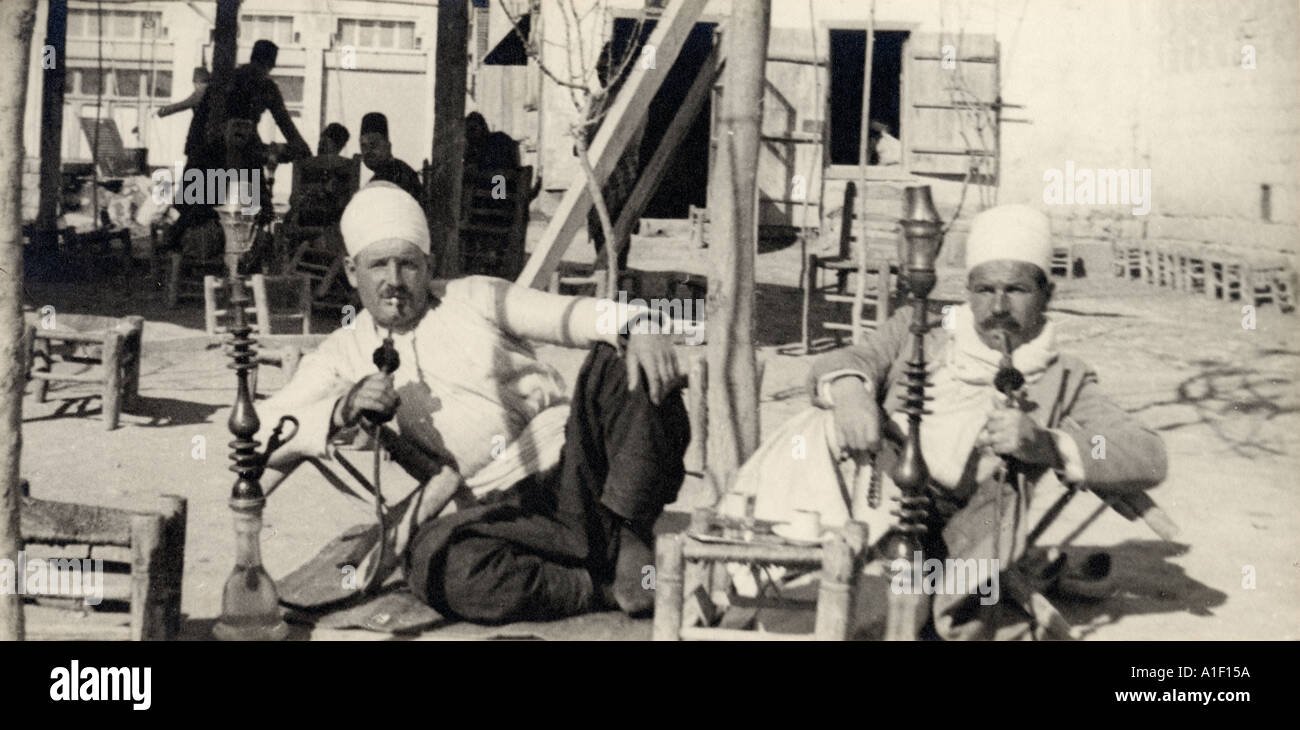 Arab men smoking from hookah s in Aleppo Stock Photo - Alamy