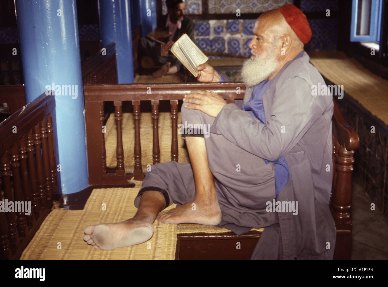 A Tunisian Jew reading the torah in El Ghrib synagogue on Djerba Island ...