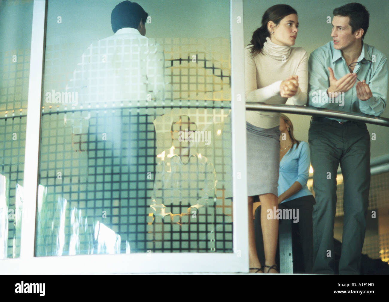 Businesspeople talking in conference room, low angle view Stock Photo ...