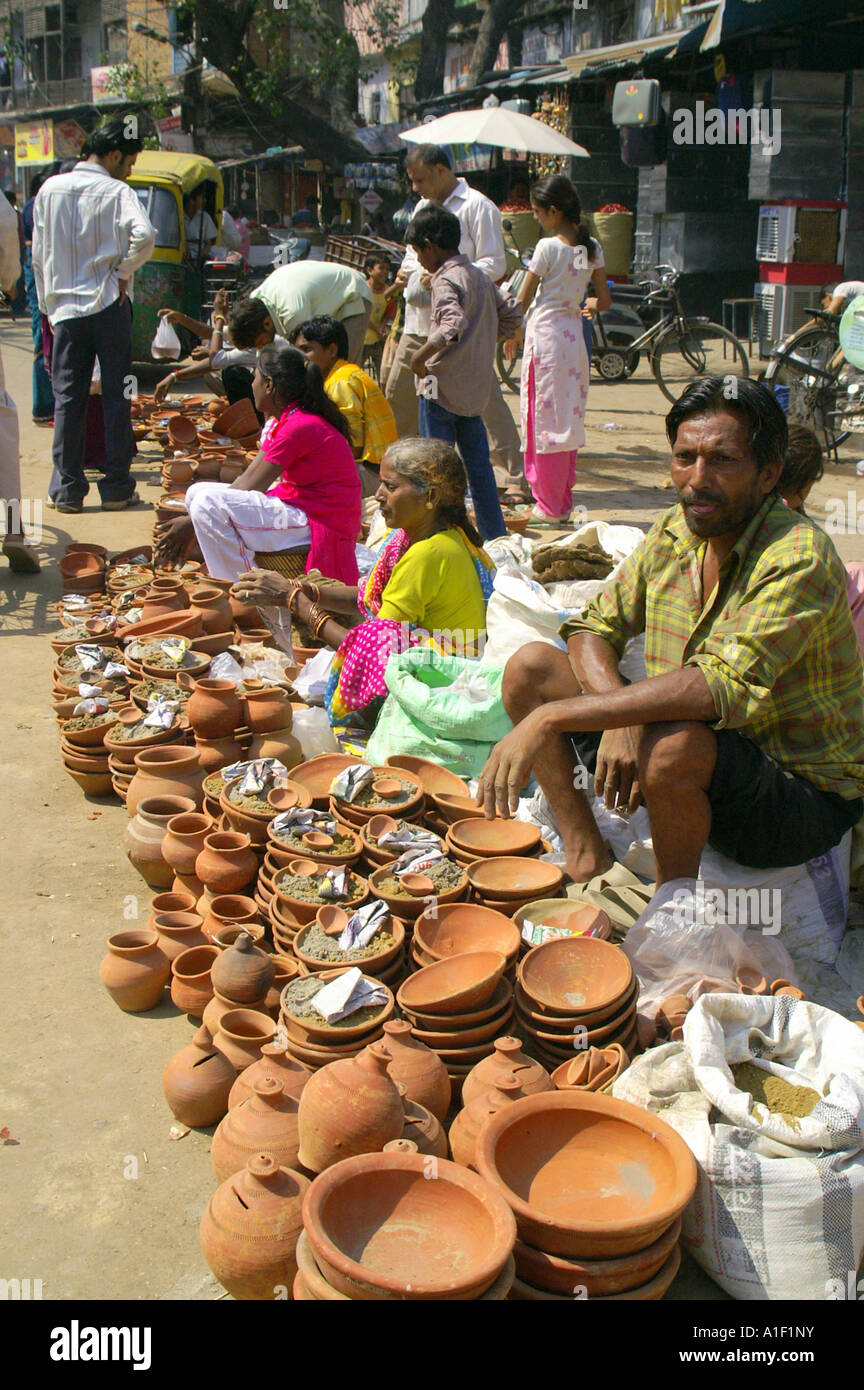 Street seller of clay pottery, New Delhi, India Stock Photo - Alamy