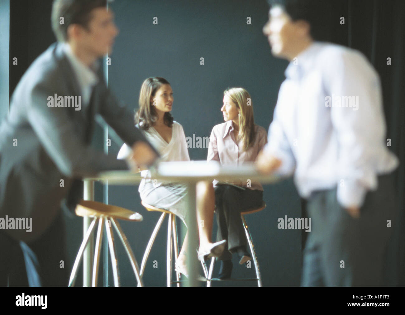 Man chatting up woman in bar hi-res stock photography and images - Alamy