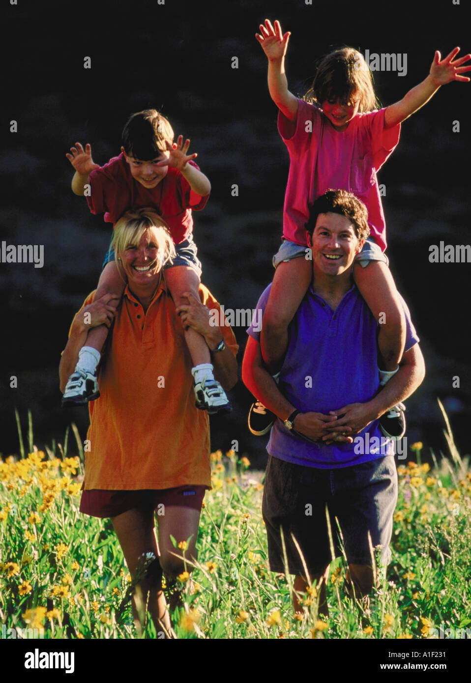 Riding on moms shoulders hi-res stock photography and images - Alamy