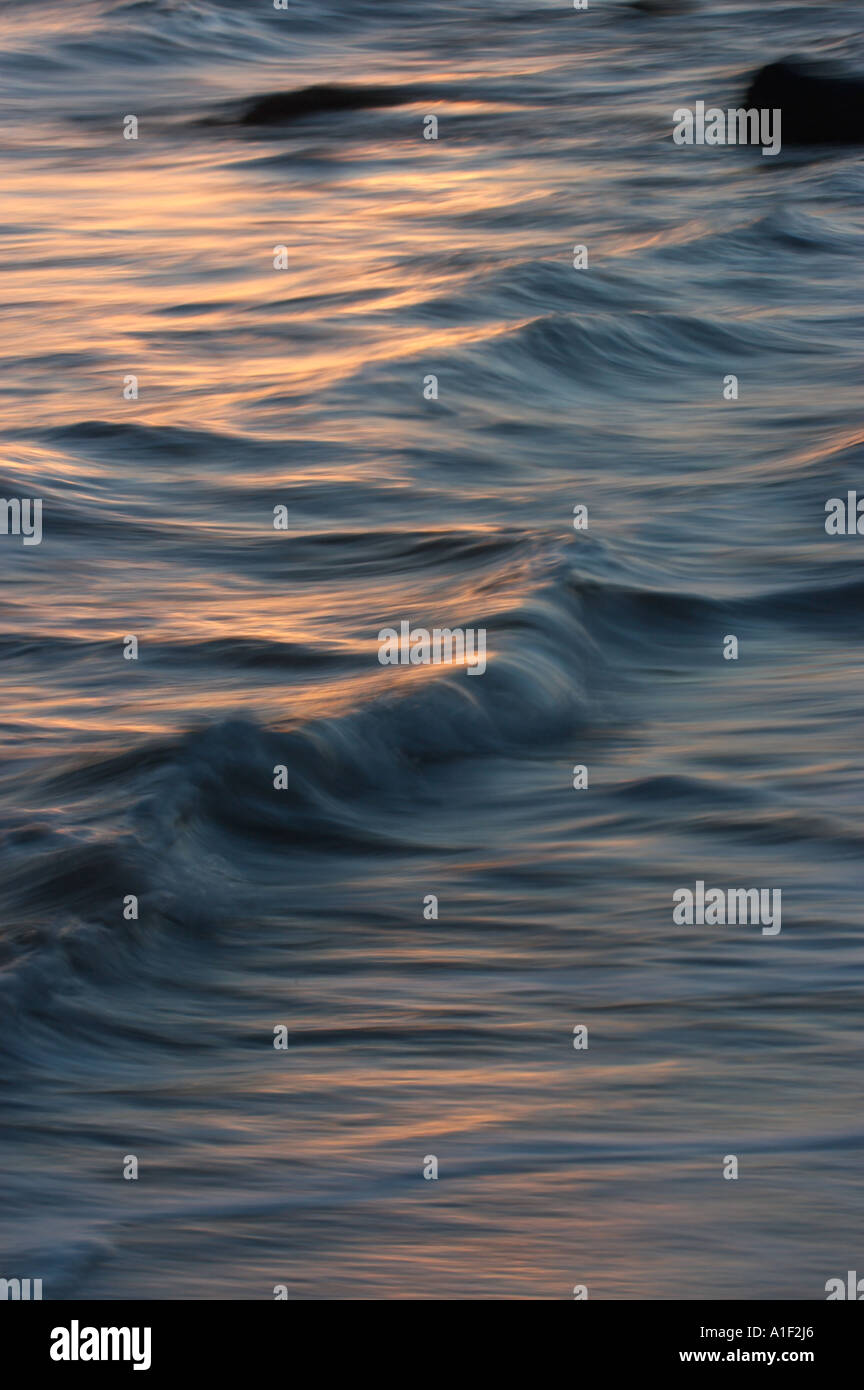 sunset beach water Stock Photo - Alamy