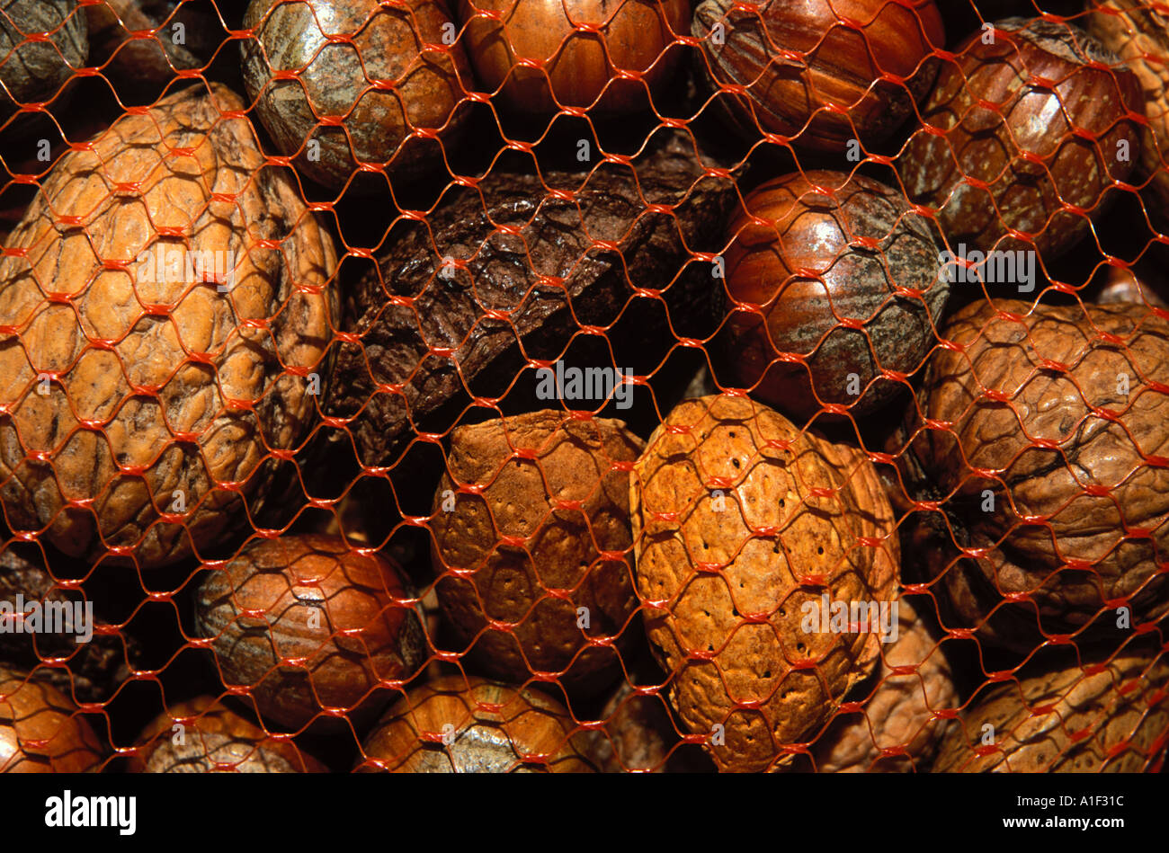 Net bag of nuts hi-res stock photography and images - Alamy