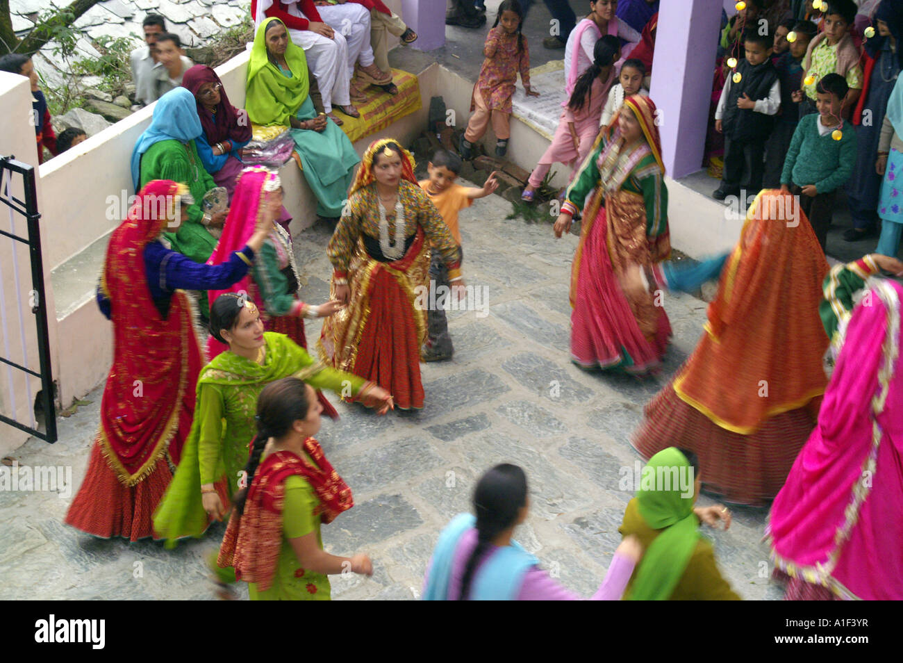 Group of indian dancers dancing at traditional festival, Bhagsunag ...