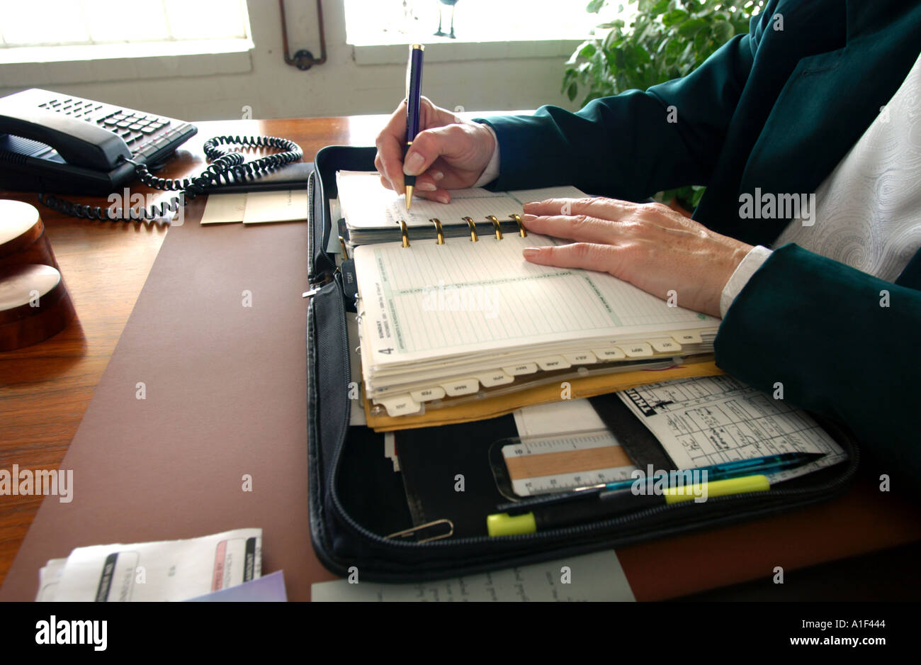 Day Timer with Hands Stock Photo - Alamy